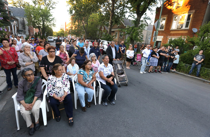 St. Agnes of Bohemia parishioners pray for peace at outdoor street ...