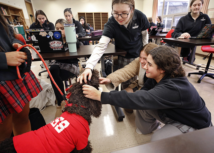 Resurrection Prep student training therapy dog for her school ...